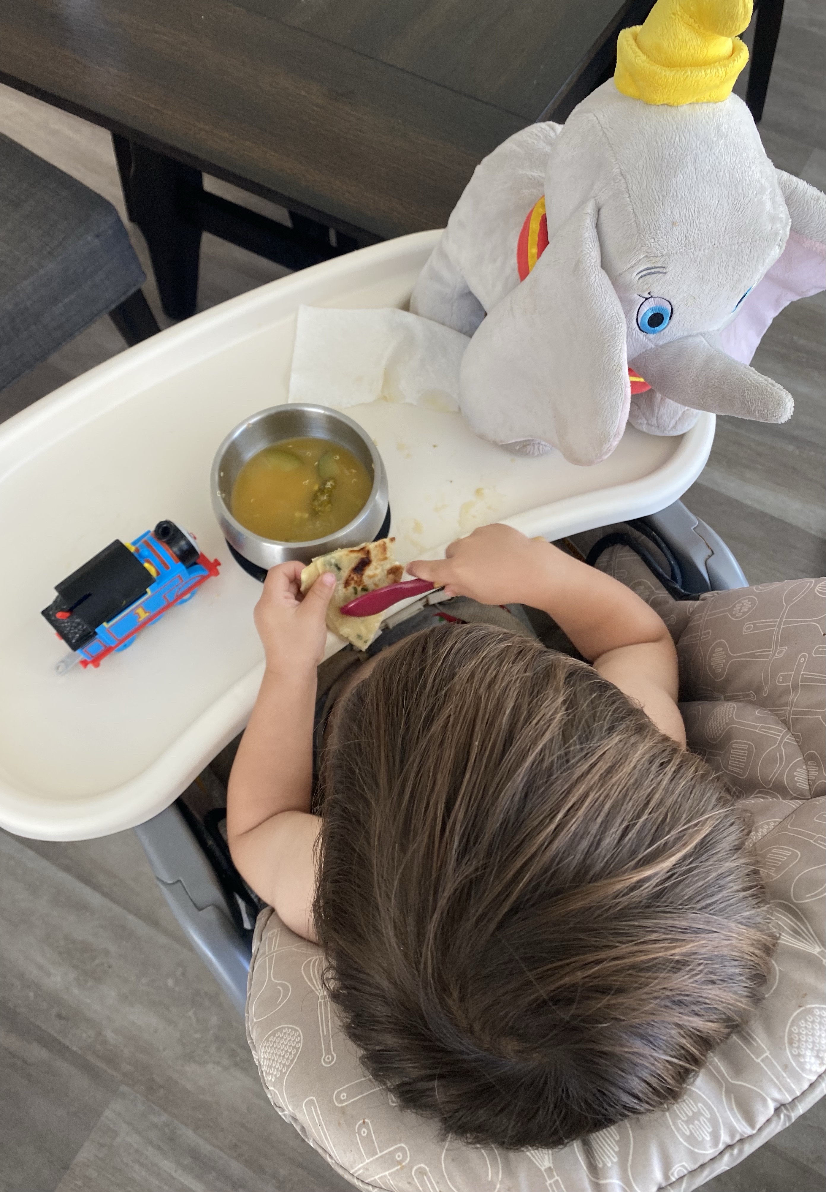 The Power of Feeding a Toy During Meals - Thrive Little
